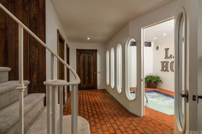 Glamming Up Boring Ceiling Fixtures // DIY Feather Light